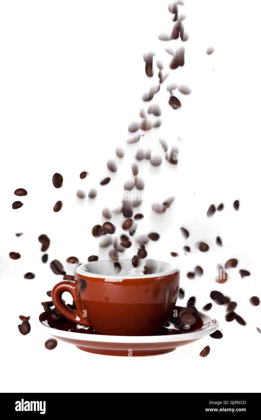 coffee bean splash isolated on white Stock Photo - Alamy