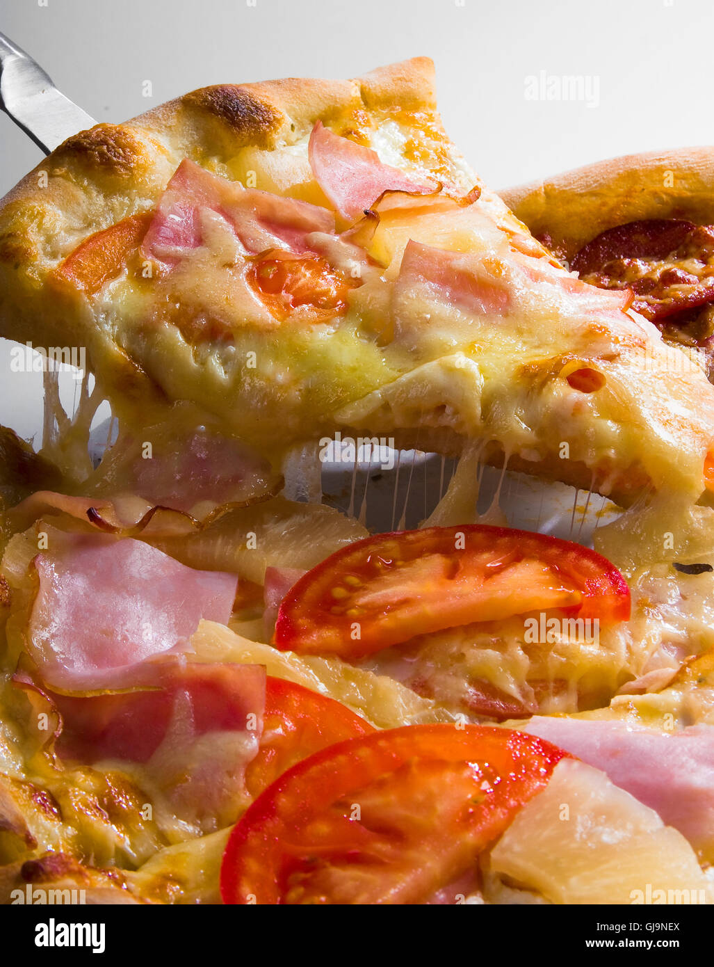pizza with ham Stock Photo - Alamy