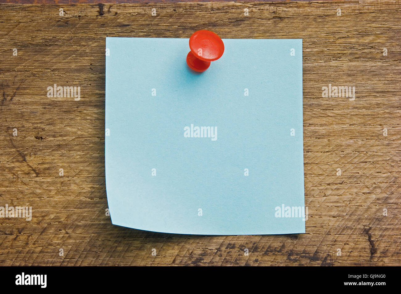 A piece of paper pinned the button Stock Photo - Alamy