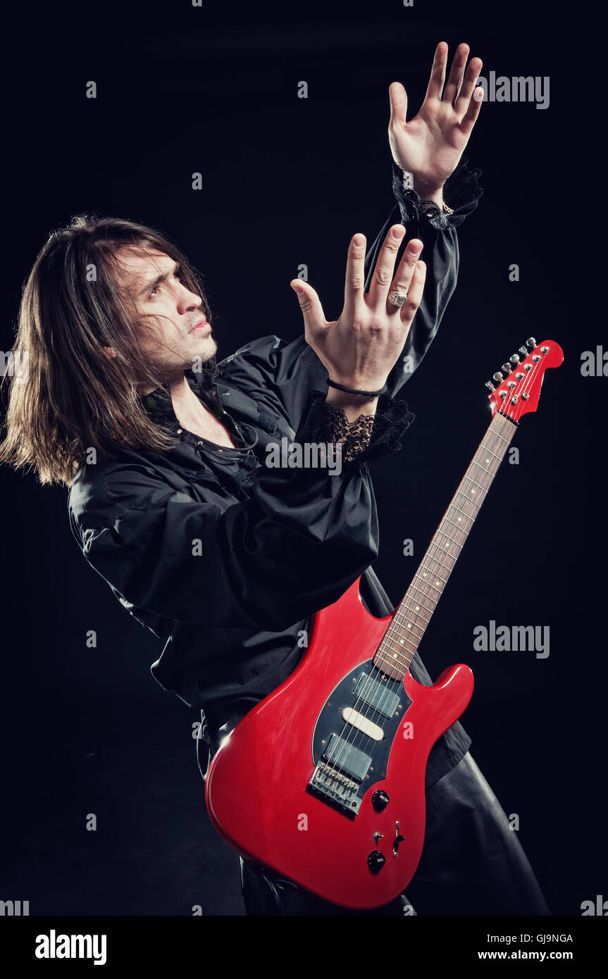 Rock-star playing a concert Stock Photo - Alamy