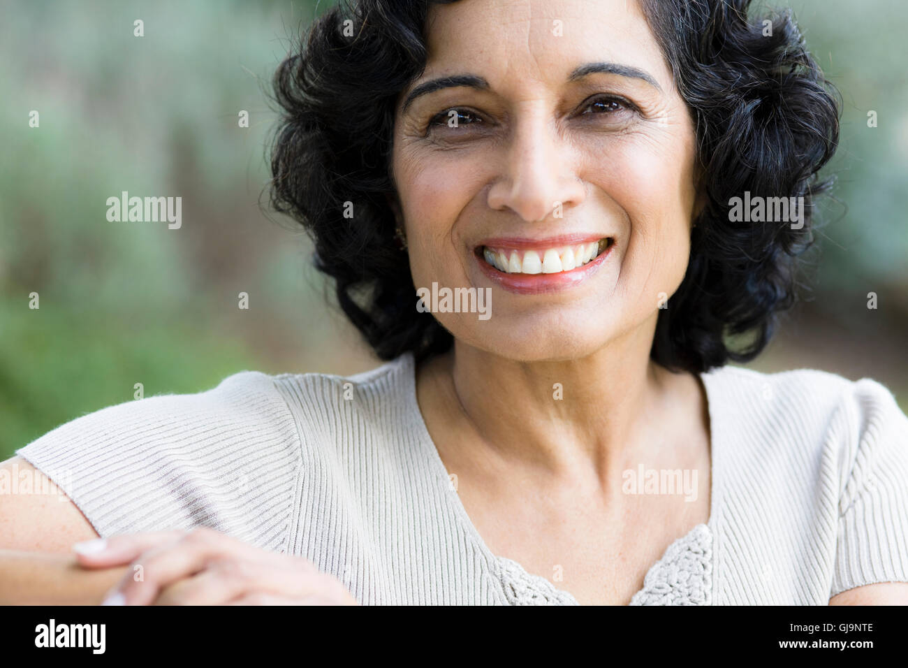 Smiling Middle-Age Woman Stock Photo - Alamy