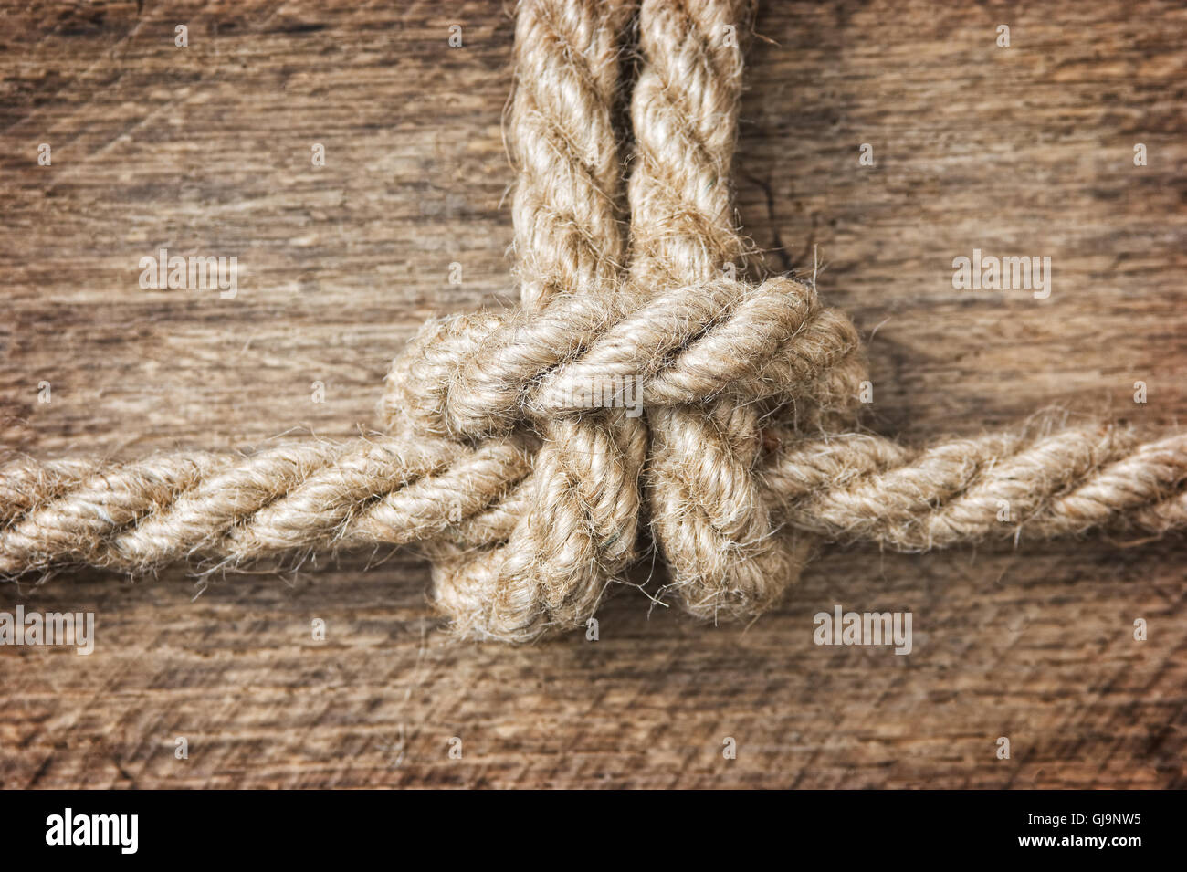 Rope with knots Stock Photo - Alamy