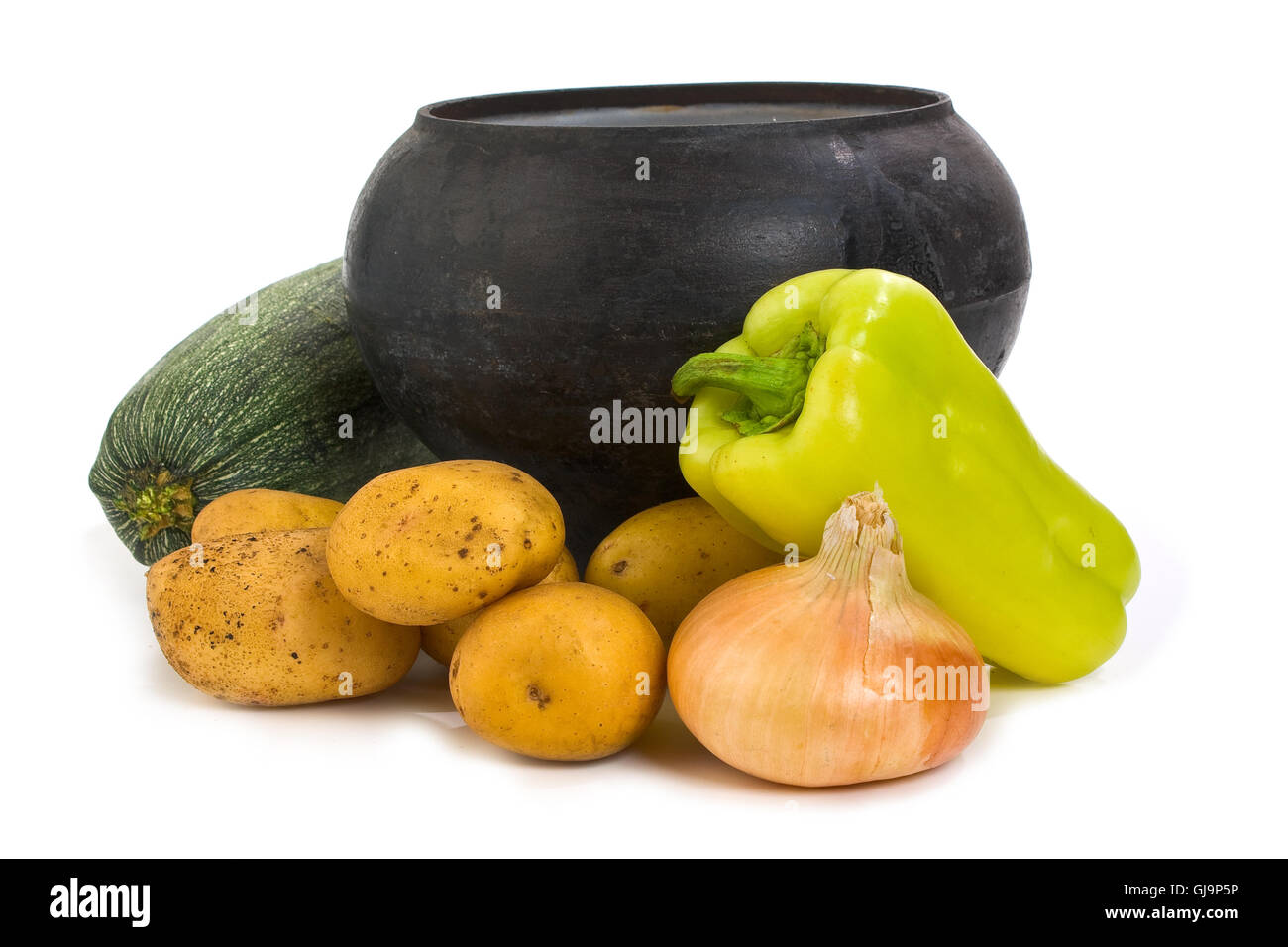 cast iron pot and vegetables Stock Photo - Alamy