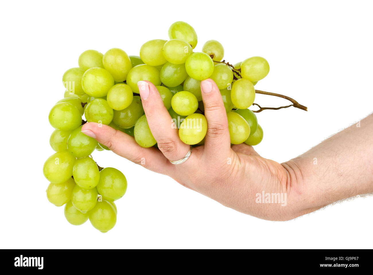 Hand holding green grapes. Isolated on the white background Stock Photo ...