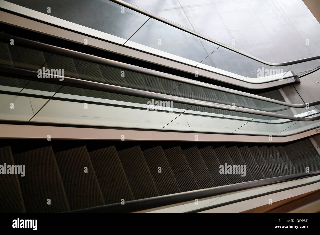 Green escalators hi-res stock photography and images - Alamy