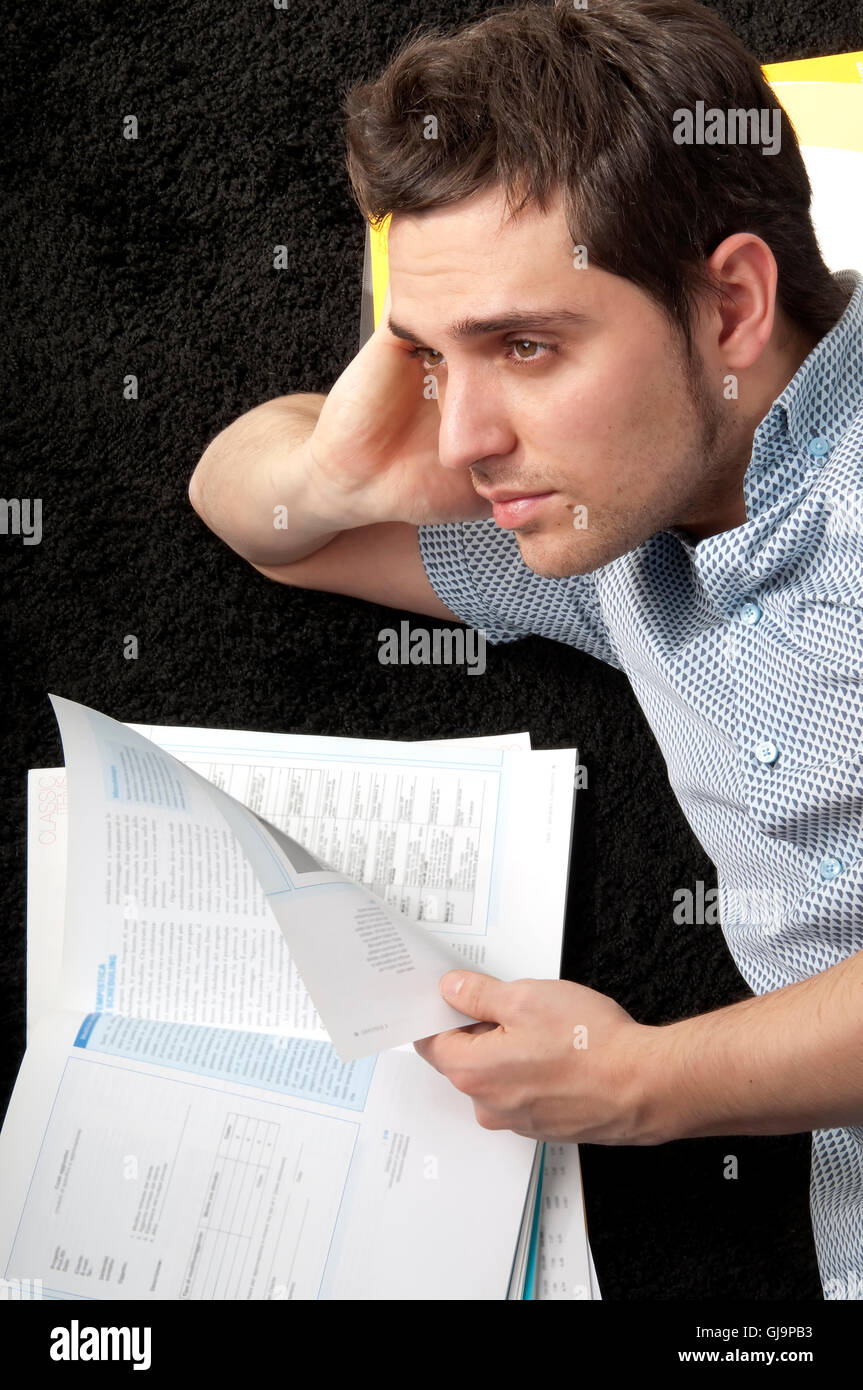 Student man with his book in camera Stock Photo - Alamy