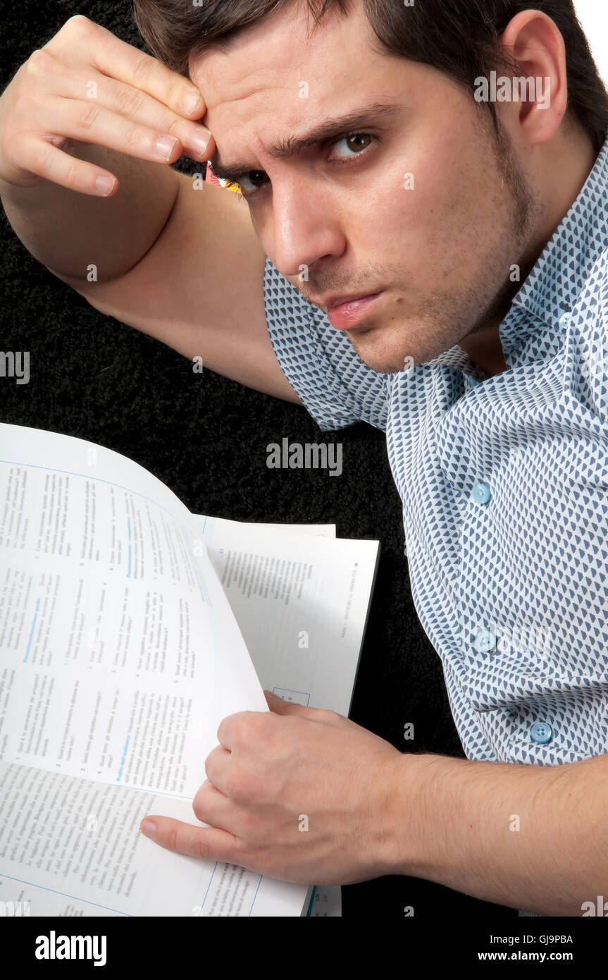 Student man with his book in camera Stock Photo - Alamy