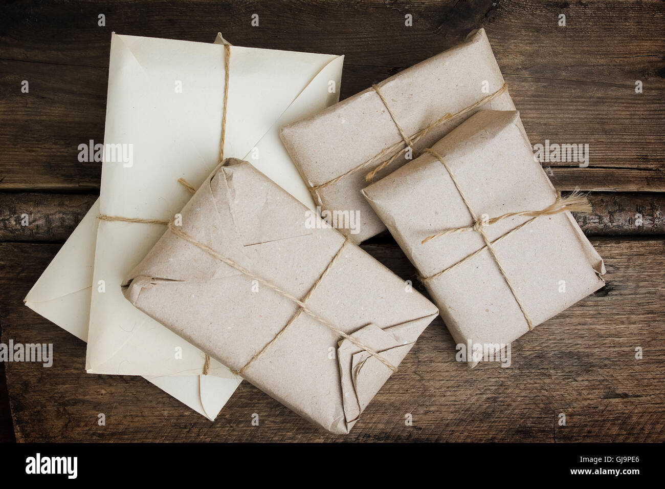 Postage on the background of an old board Stock Photo - Alamy