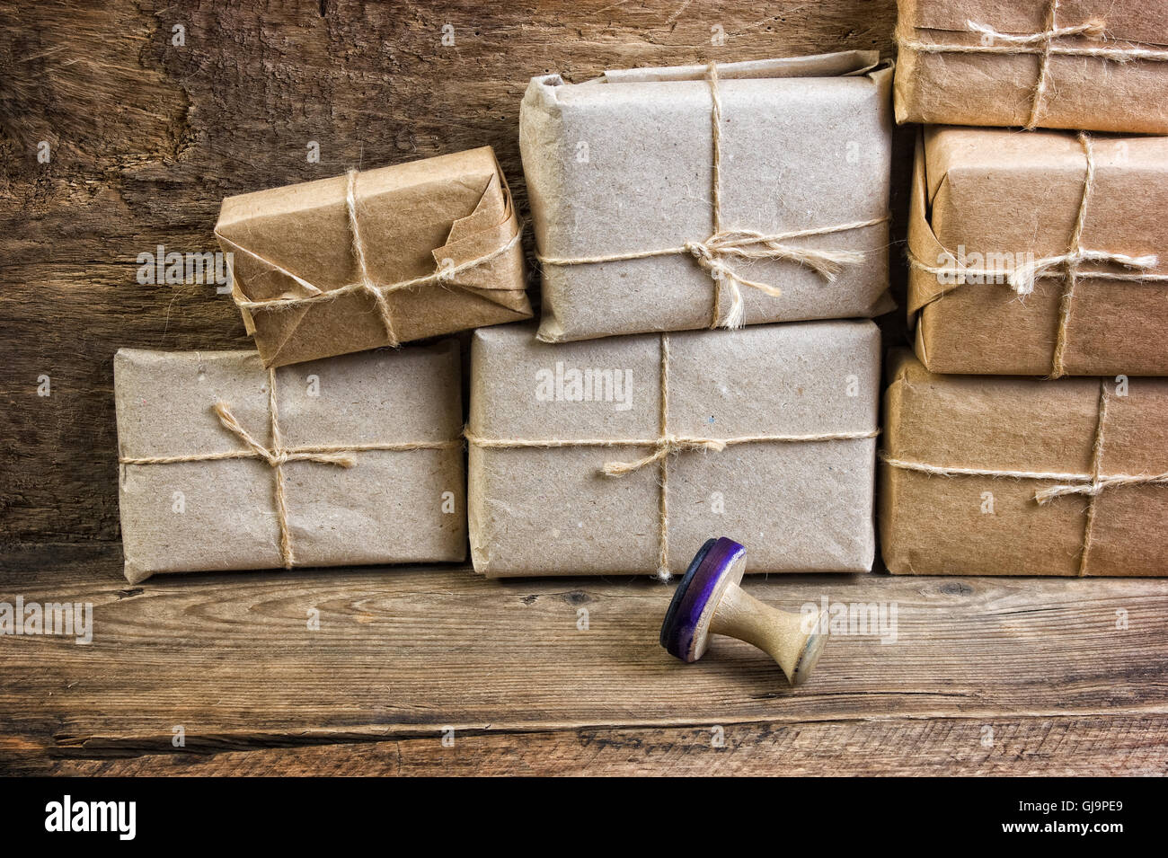 Postage on the background of an old board Stock Photo - Alamy