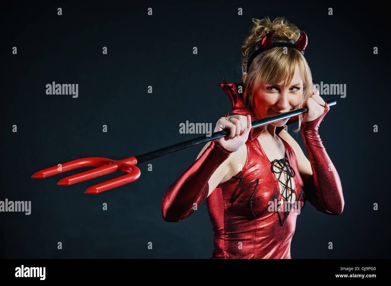 Red devil woman Stock Photo - Alamy