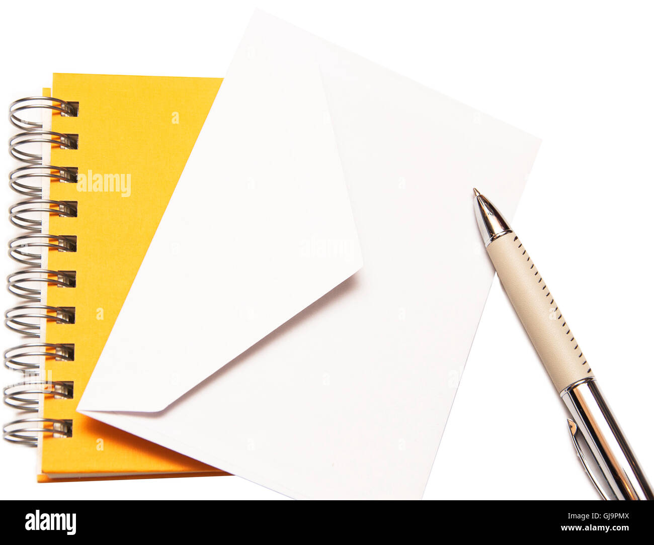 white envelope spiral notepad and pen Stock Photo - Alamy