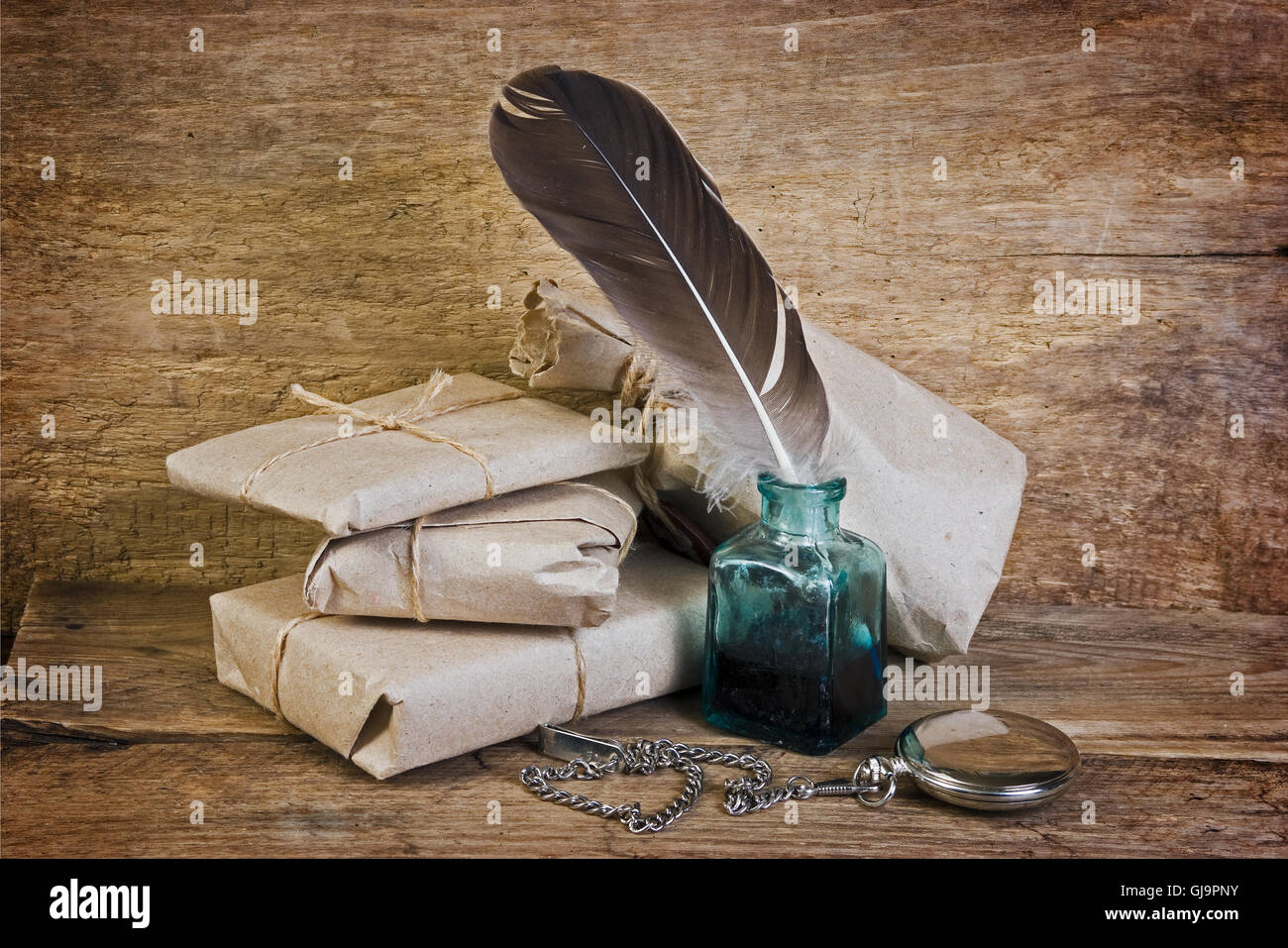 Postage on the background of board Stock Photo - Alamy