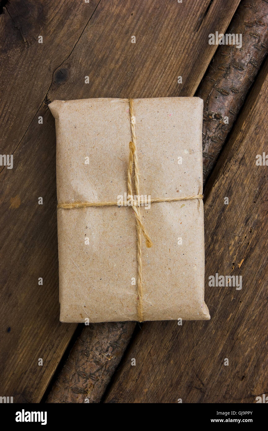 Postage on the background of an old board Stock Photo - Alamy