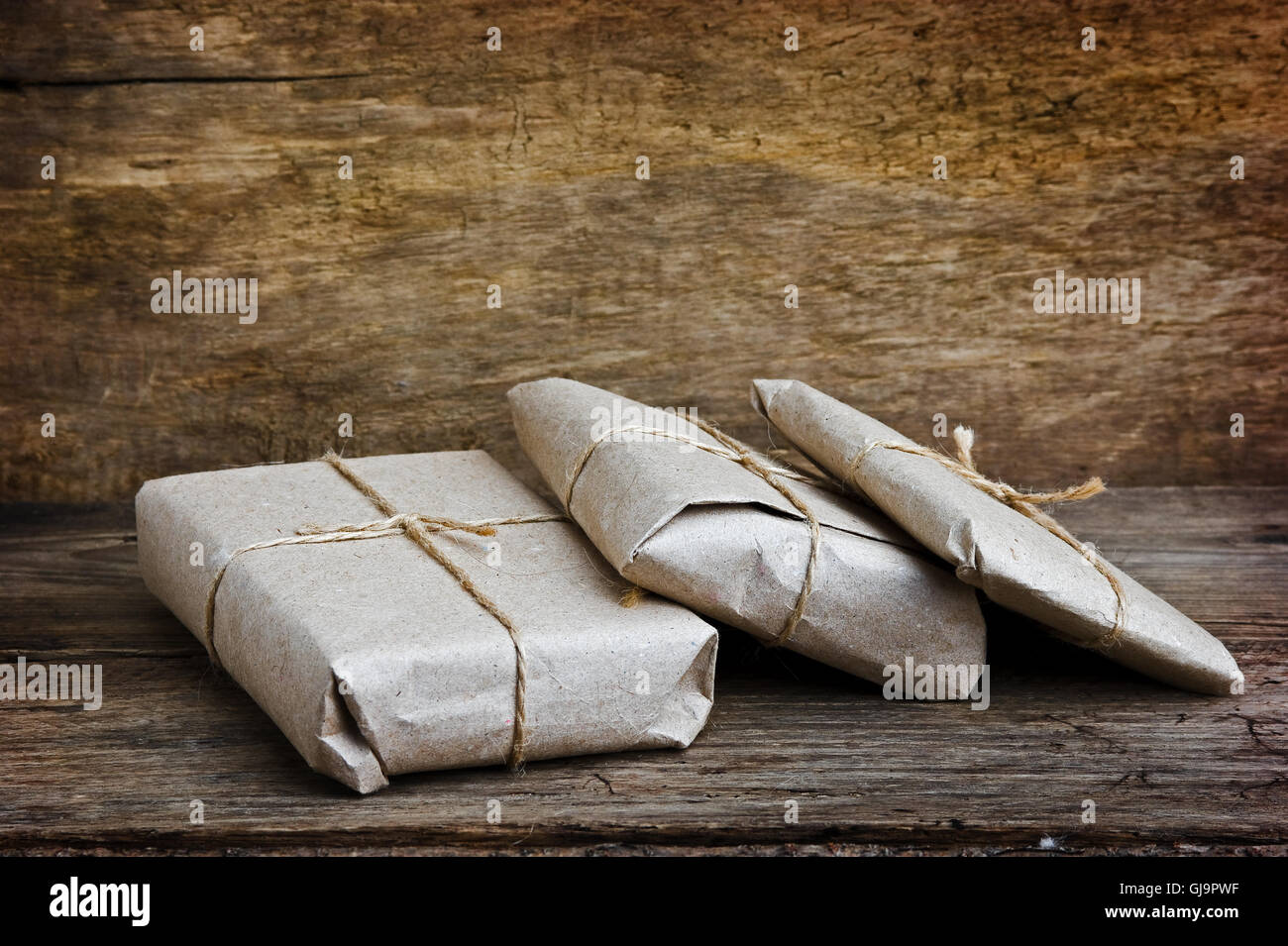 Postage on the background of an old board Stock Photo - Alamy