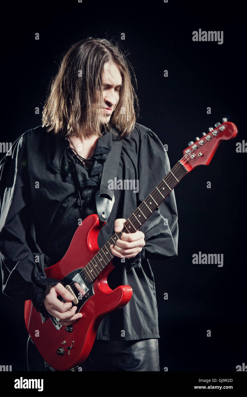Rock-star playing a concert Stock Photo - Alamy