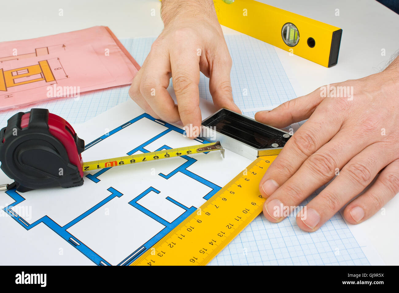 drawing at home with construction tools Stock Photo - Alamy