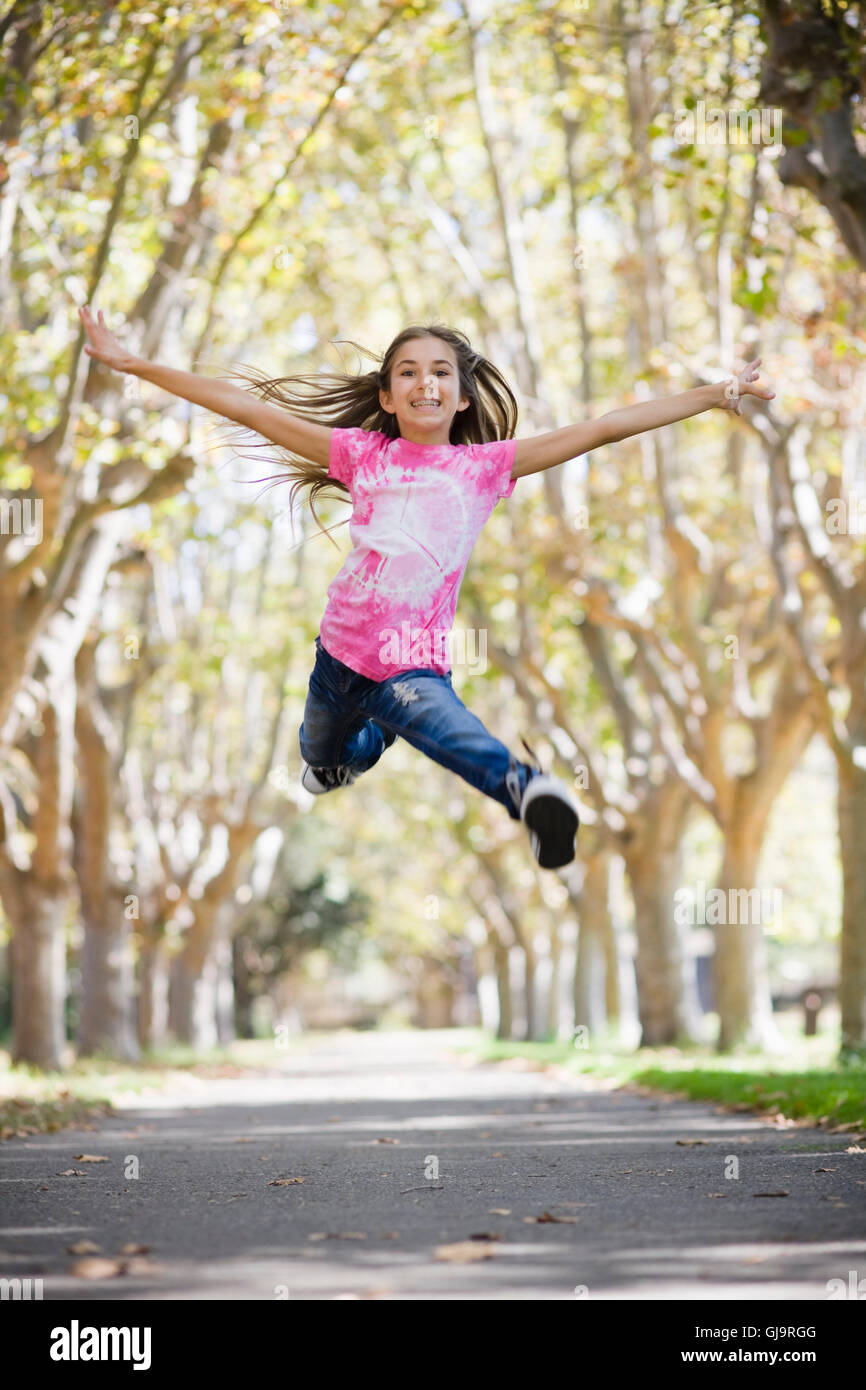 Tween Girl Jumping Stock Photo - Alamy