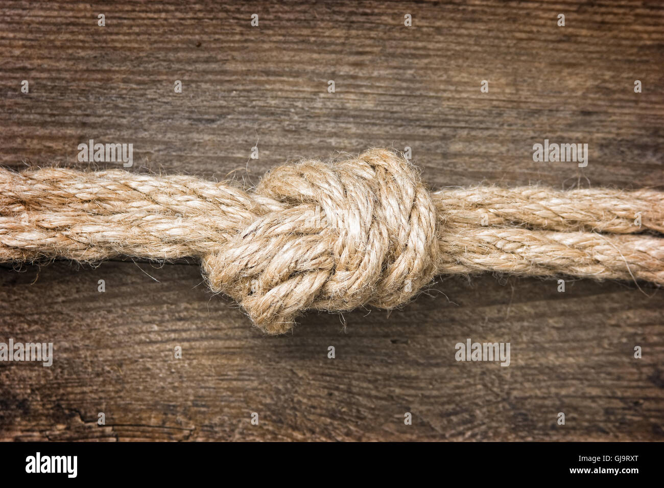Rope with knots Stock Photo - Alamy