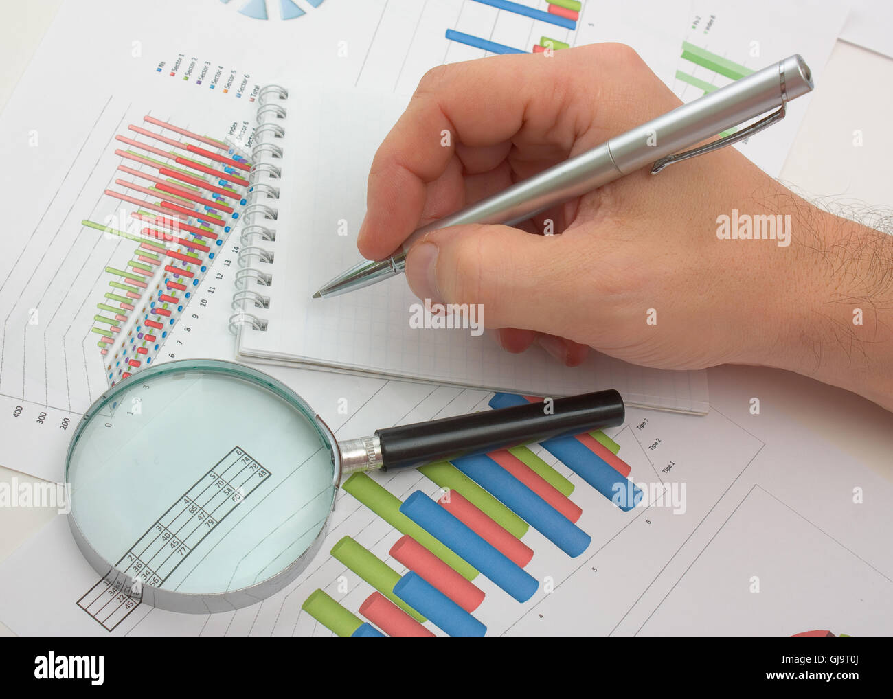 Graphs tables and documents Stock Photo - Alamy