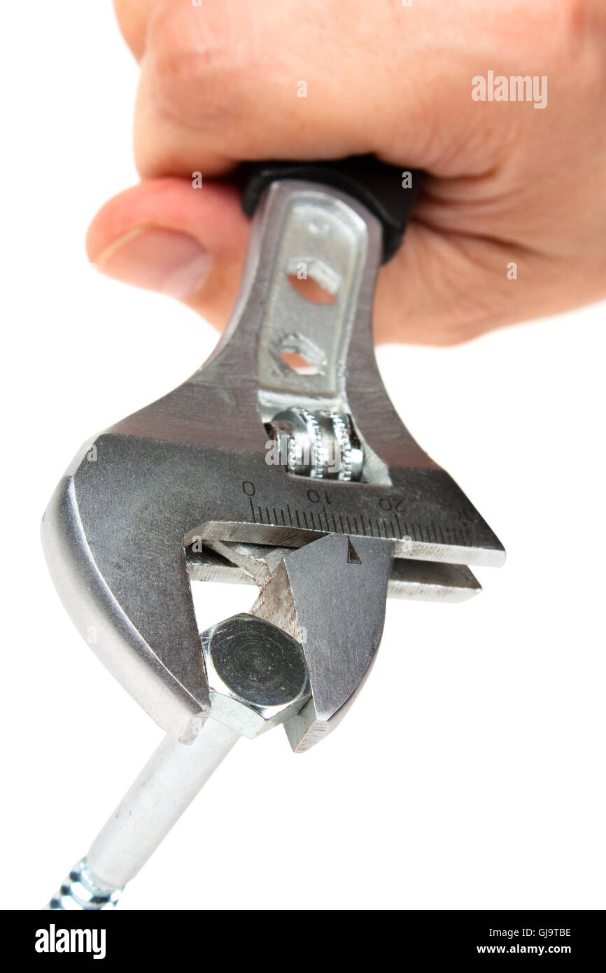 wrench with the screw in his hand Stock Photo - Alamy
