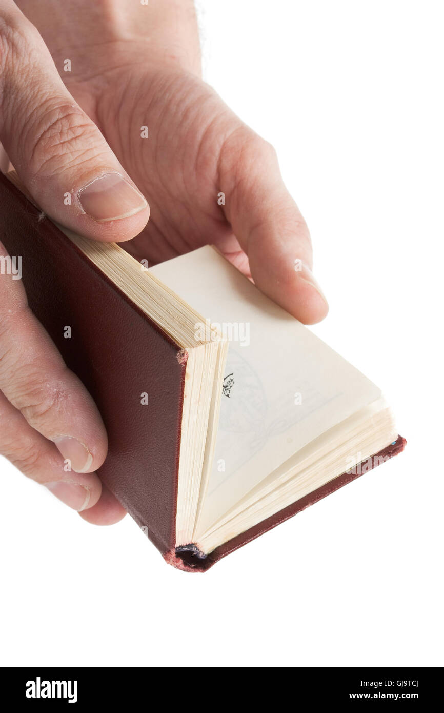book in hand Stock Photo - Alamy
