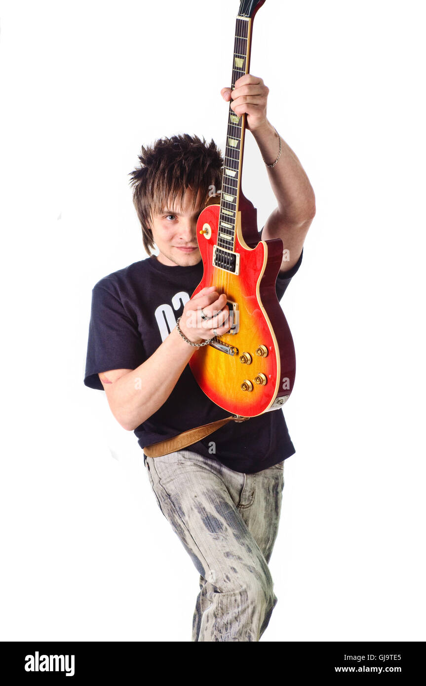 Rocker with electric guitar Stock Photo - Alamy