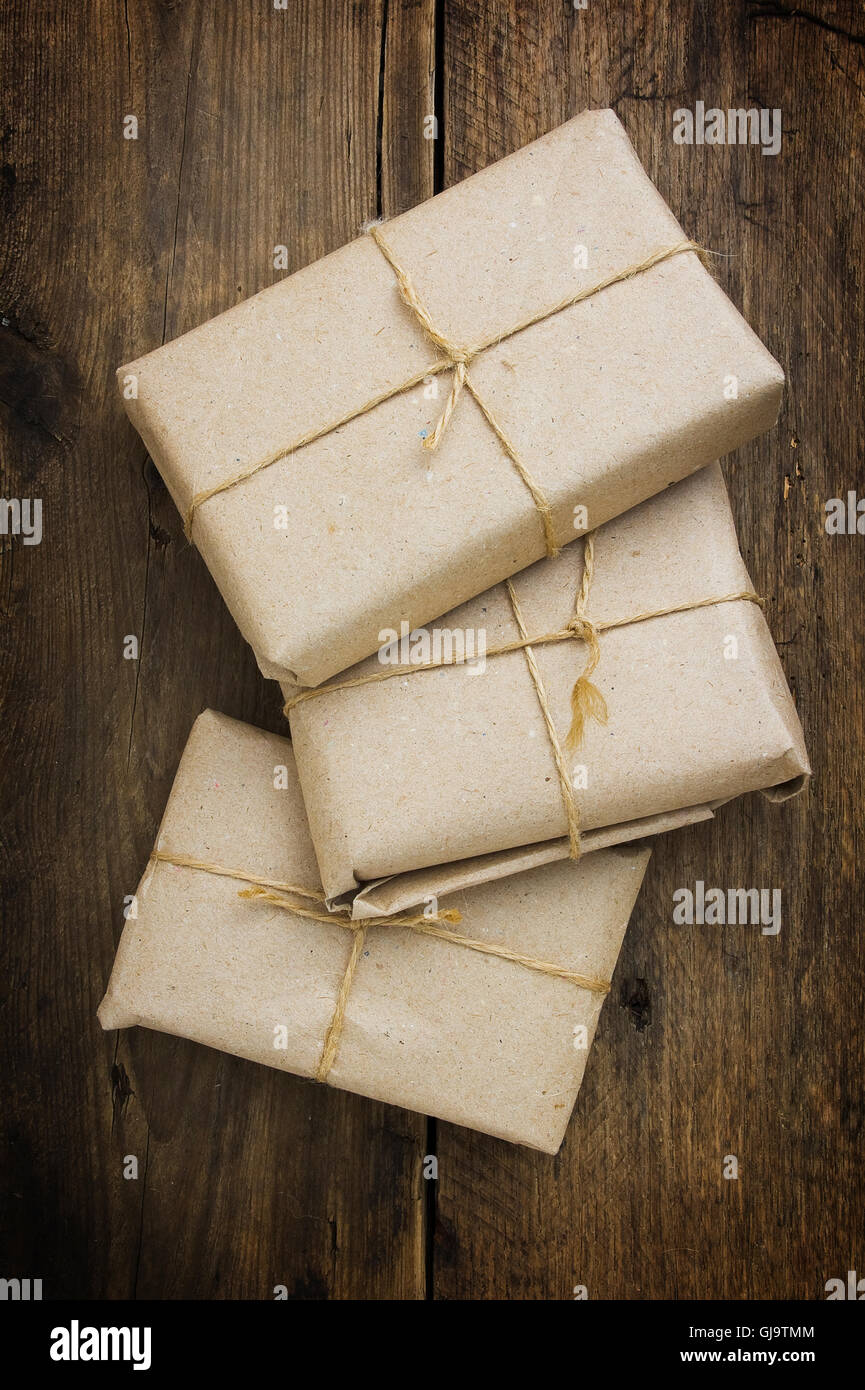 Postage on the background of an old board Stock Photo - Alamy