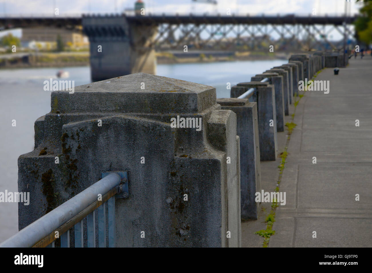 Concrete and Steel Railing near river Stock Photo - Alamy