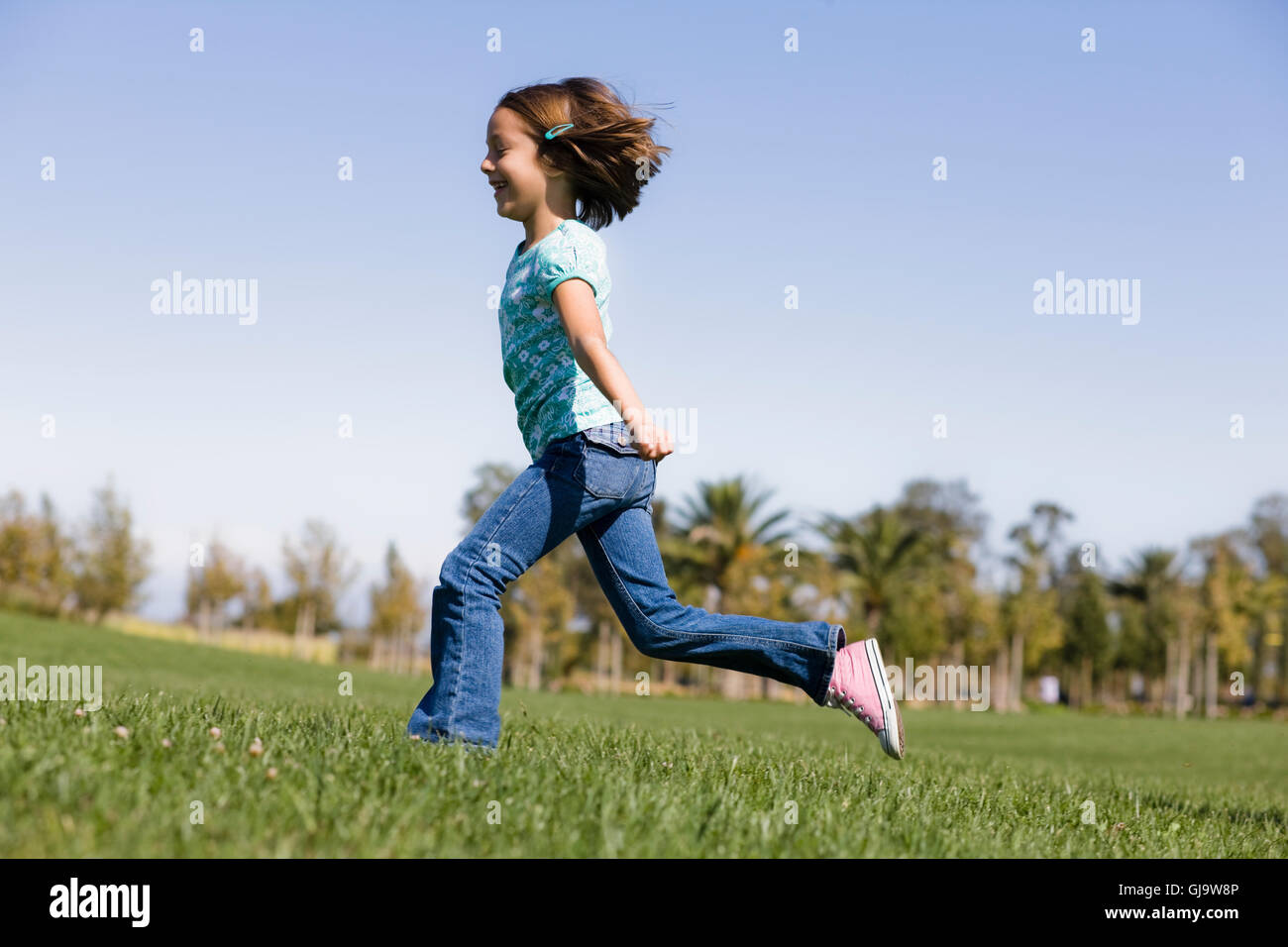 Girl in Park Stock Photo - Alamy