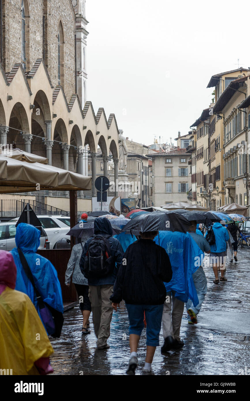 Tourists walk in the rain in Florence, Tuscany, Italy Stock Photo - Alamy