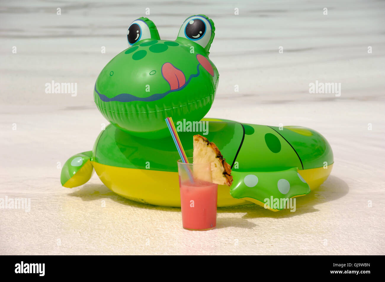 Frog and drink Stock Photo - Alamy