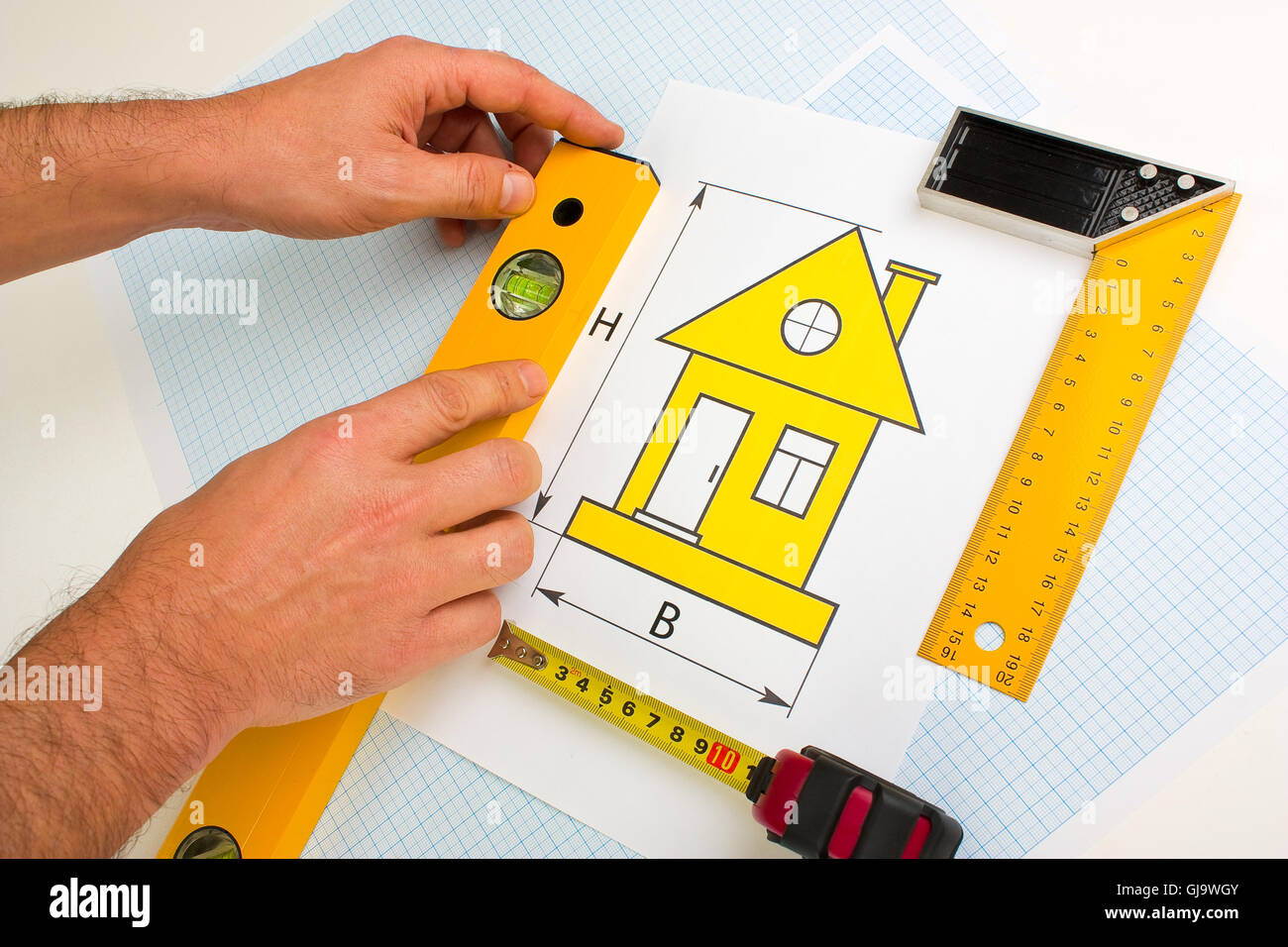 drawing at home with construction tools Stock Photo - Alamy
