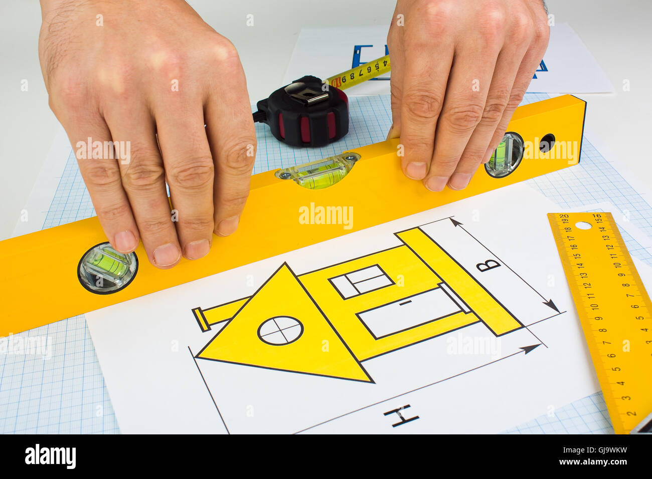 drawing at home with construction tools Stock Photo - Alamy