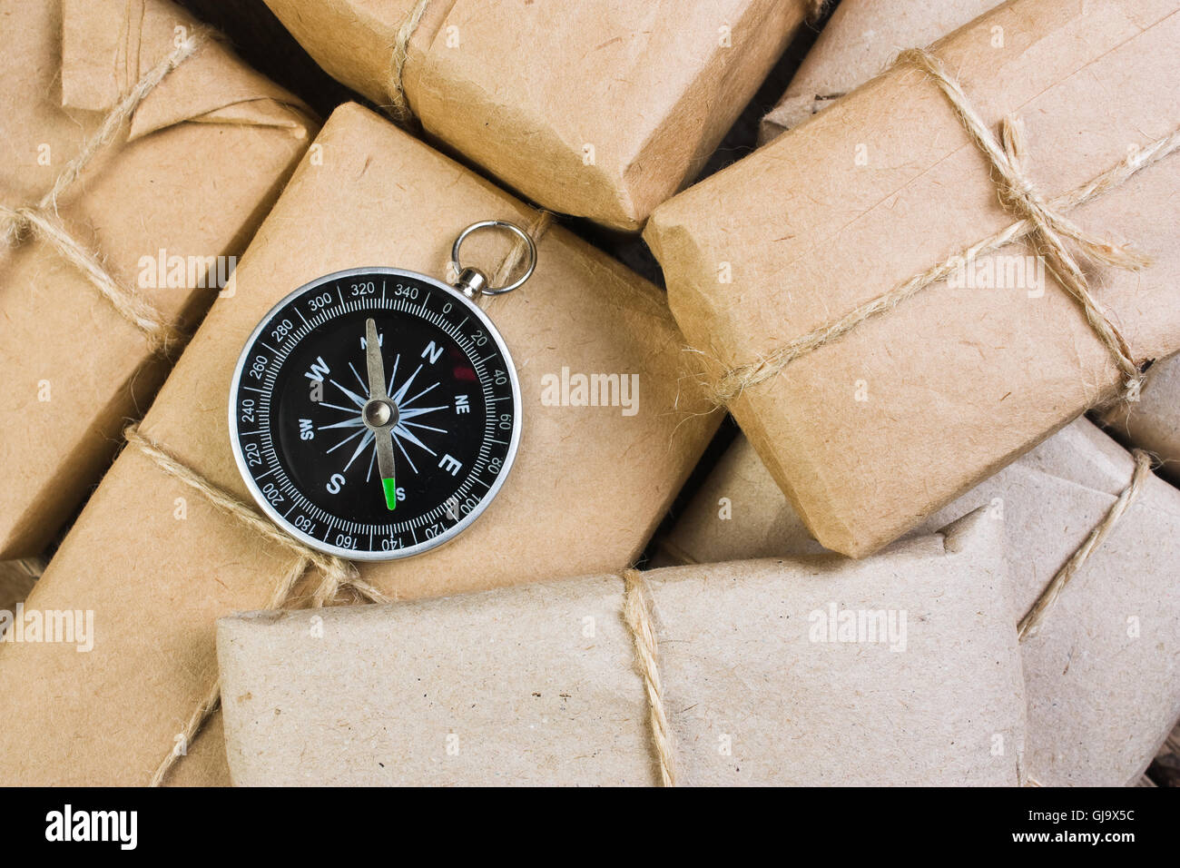 Postage on the background of an old board Stock Photo - Alamy
