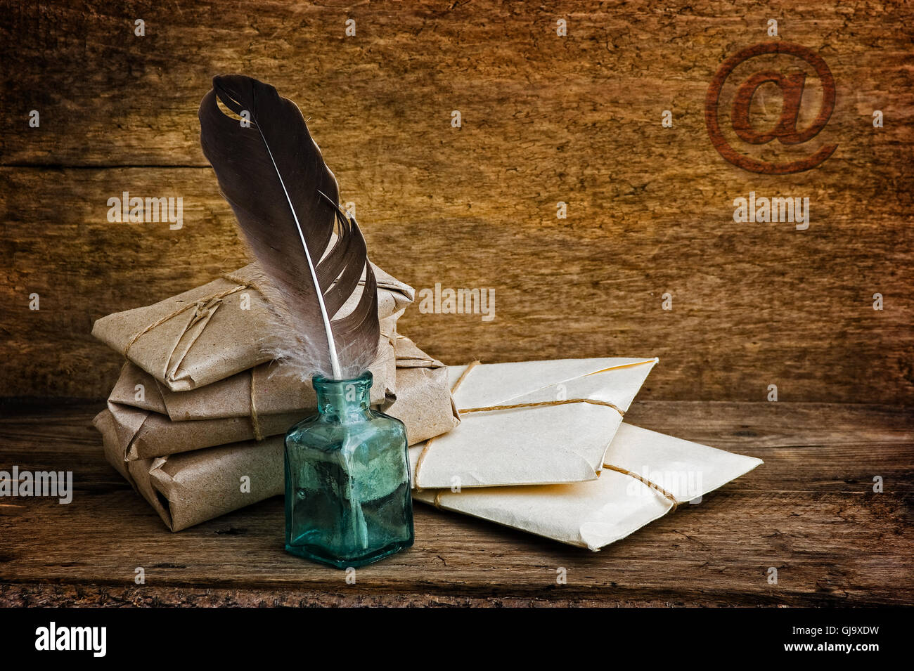 Postage on the background of an old board Stock Photo - Alamy
