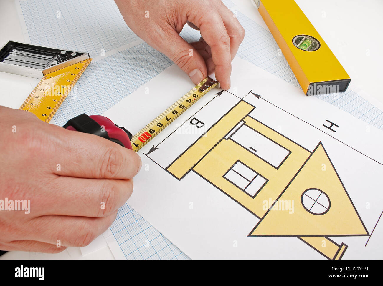 drawing at home with construction tools Stock Photo - Alamy