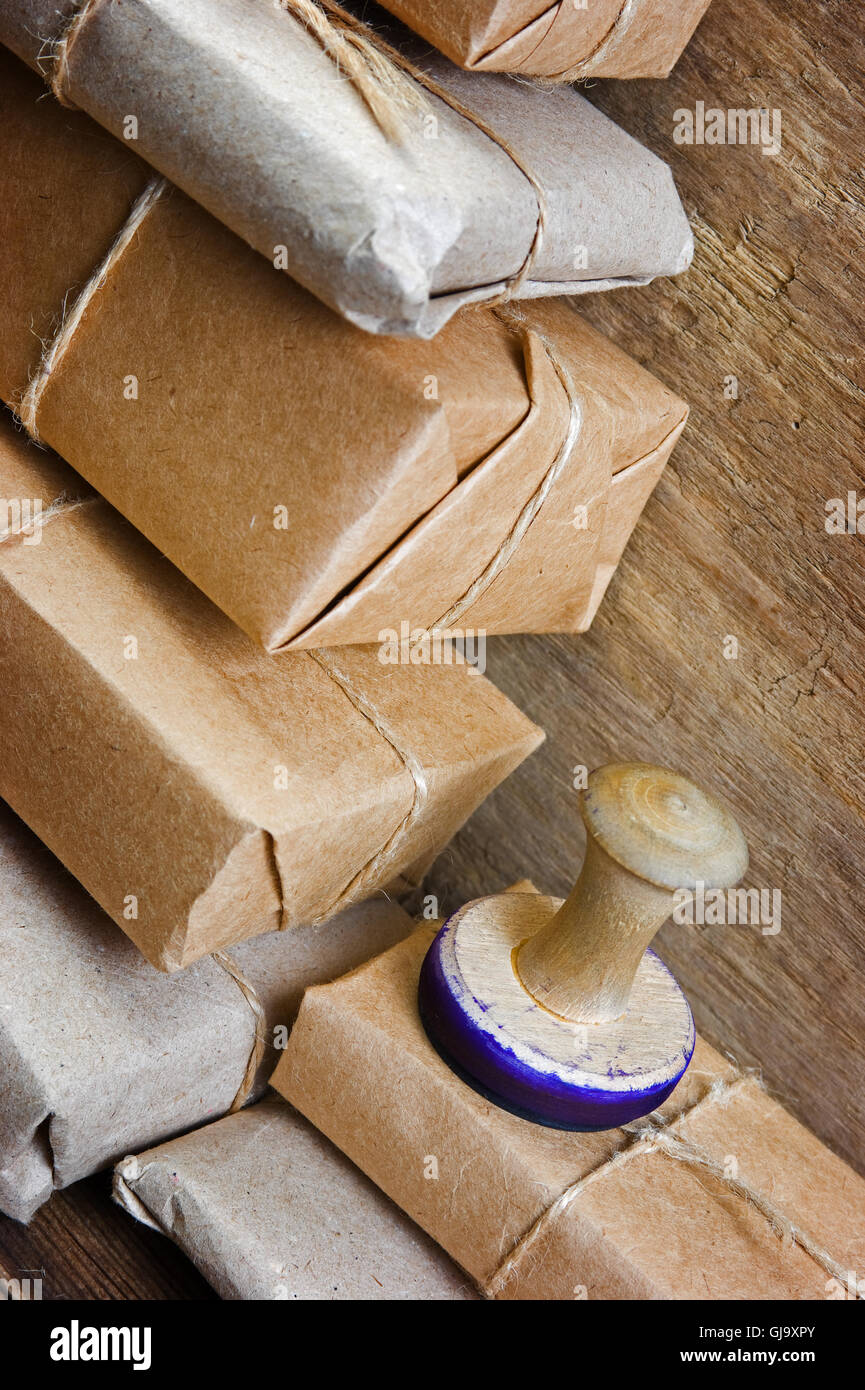 Postage on the background of an old board Stock Photo - Alamy