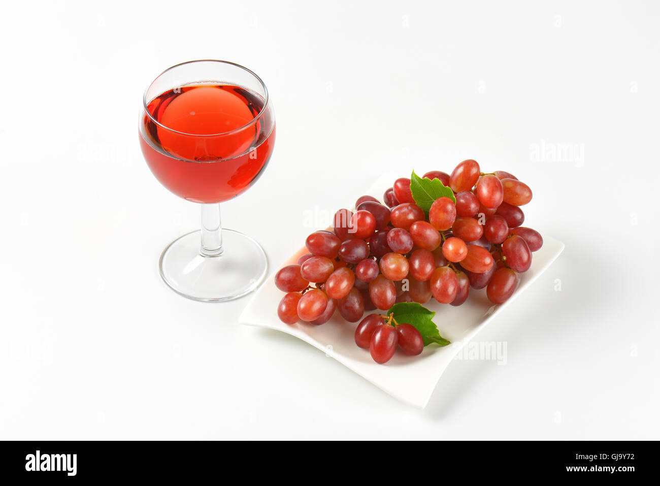 Grapes on plate bunch purple hi-res stock photography and images - Alamy