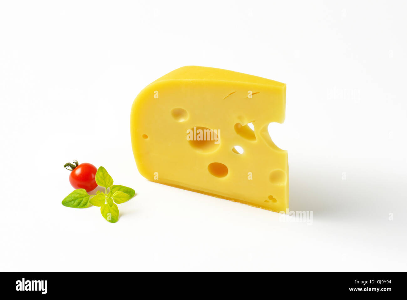 Wedge fresh swiss cheese Cut Out Stock Images & Pictures - Alamy