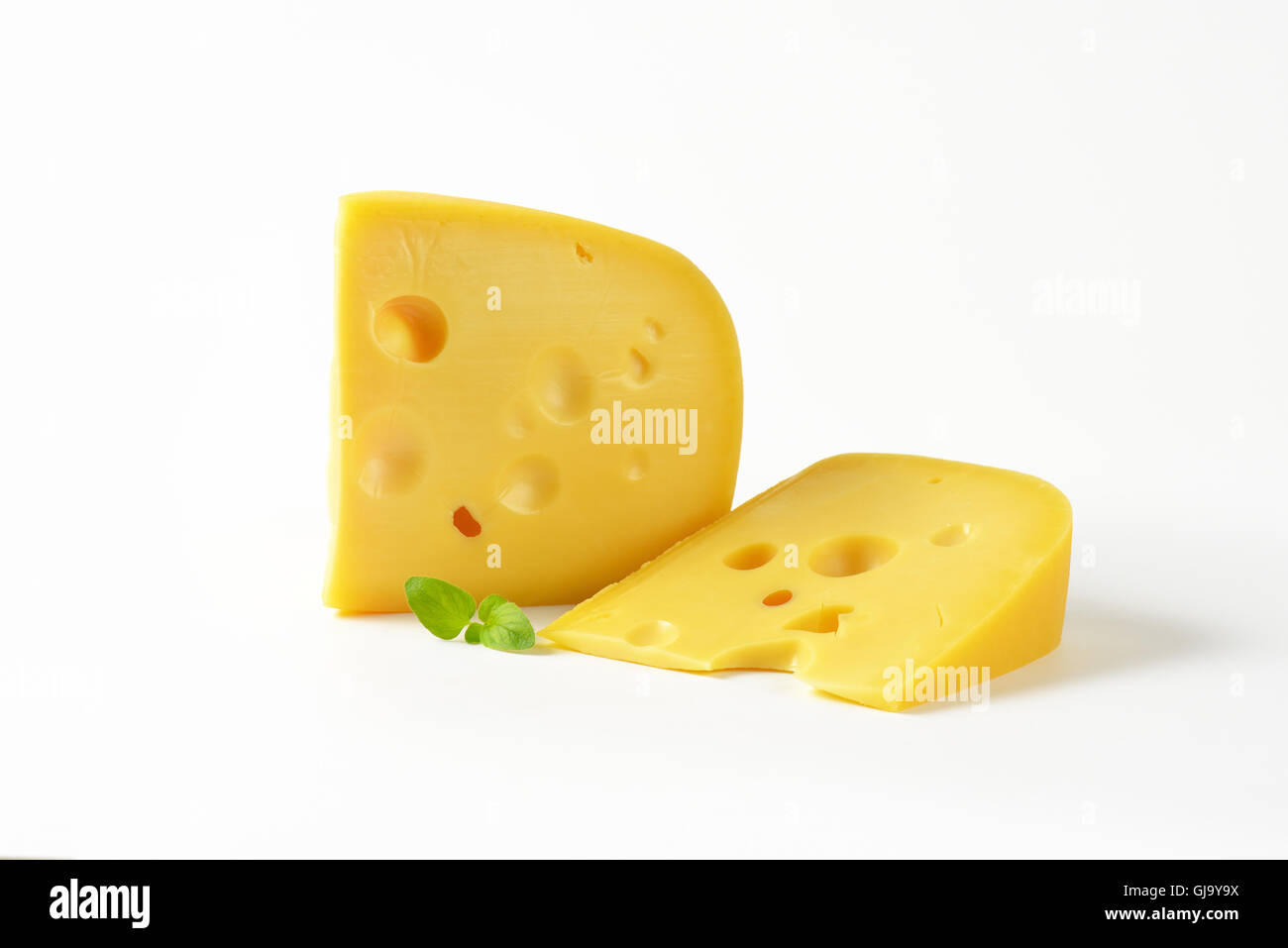 Swiss cheese wedges hi-res stock photography and images - Alamy
