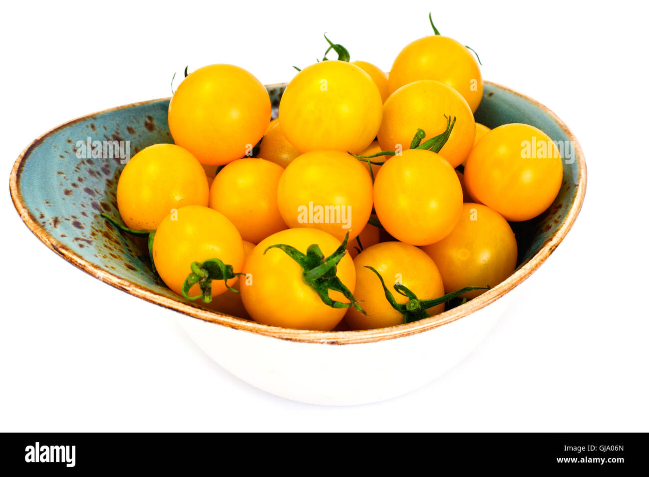 Fresh Yellow Cherry Tomato on Whyite Background Stock Photo - Alamy
