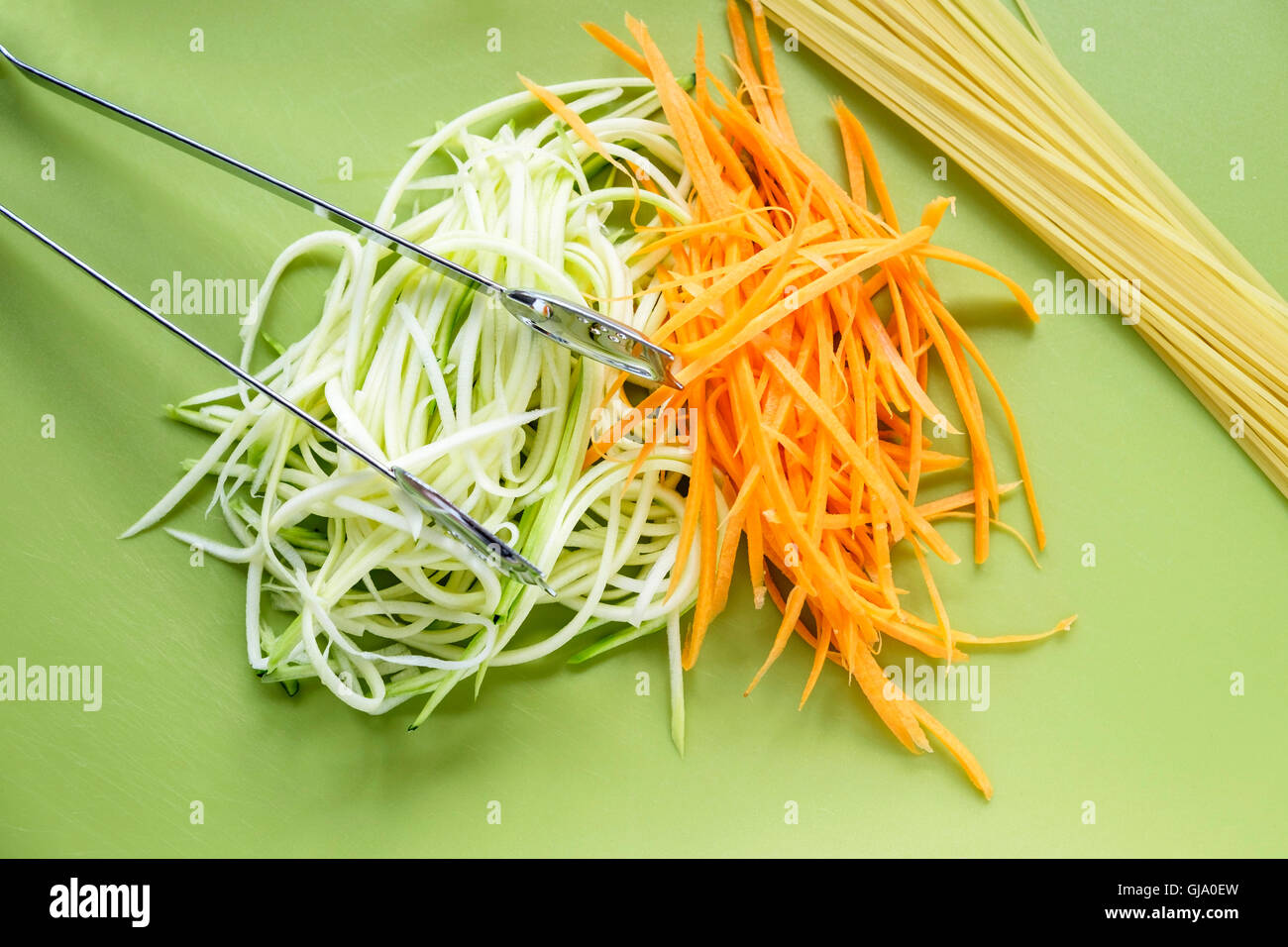 Courgette, zucchini, and carrot spirals showing a healthy alternative ...