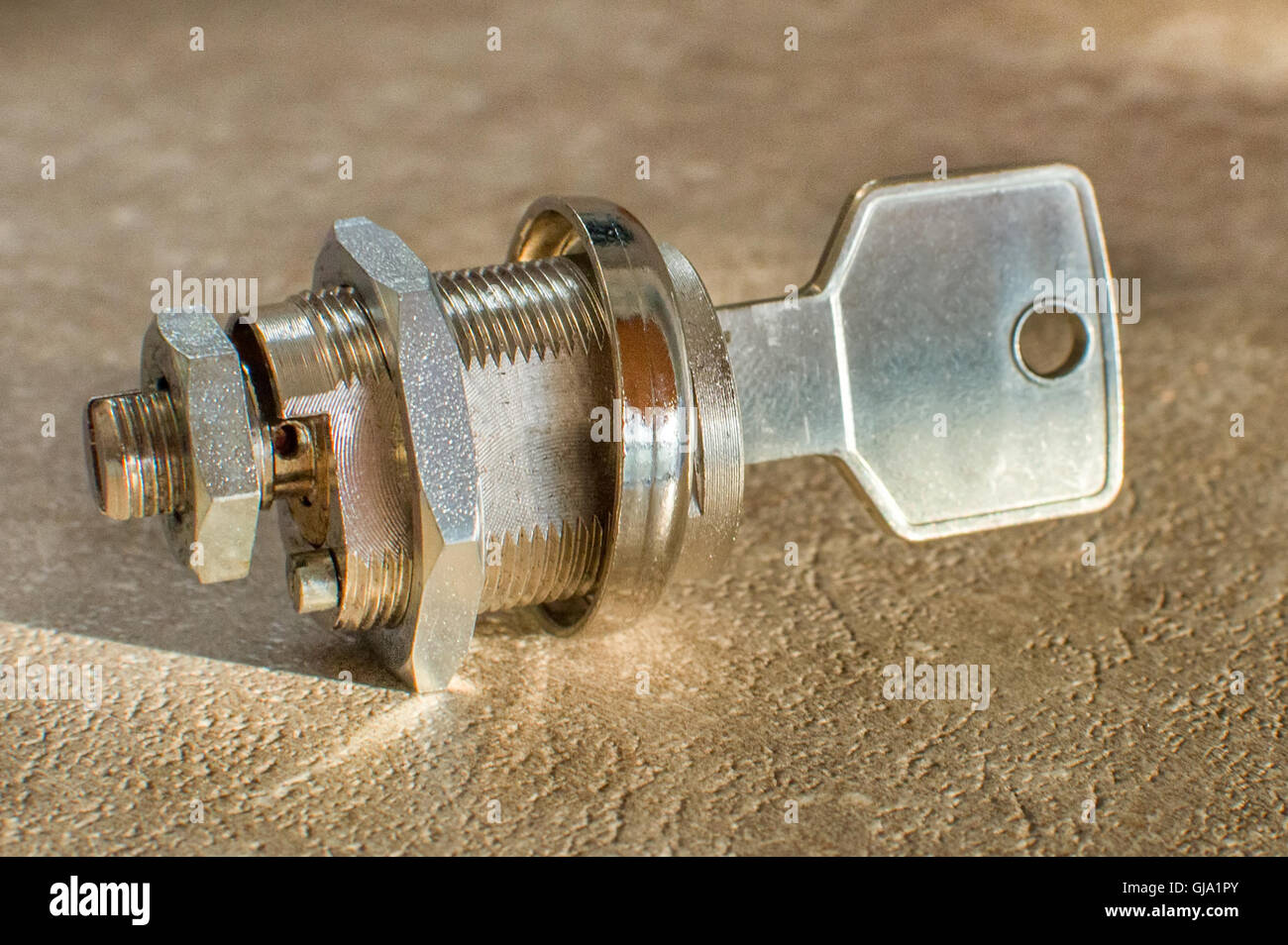 rounded circle cylinder lock key Stock Photo - Alamy