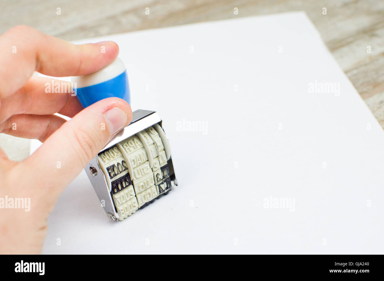 hand rubber stamp paper Stock Photo - Alamy