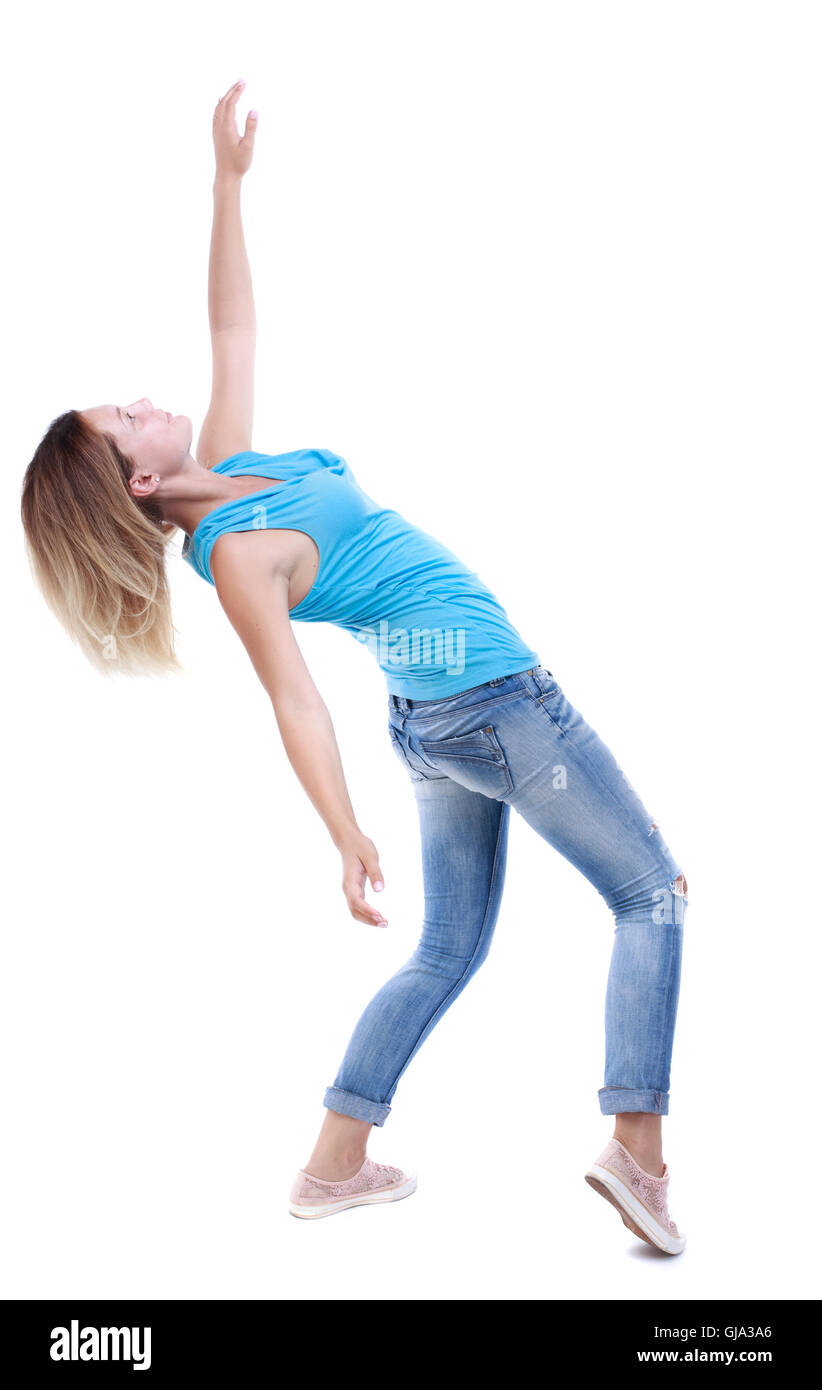 Balancing young woman Stock Photo - Alamy
