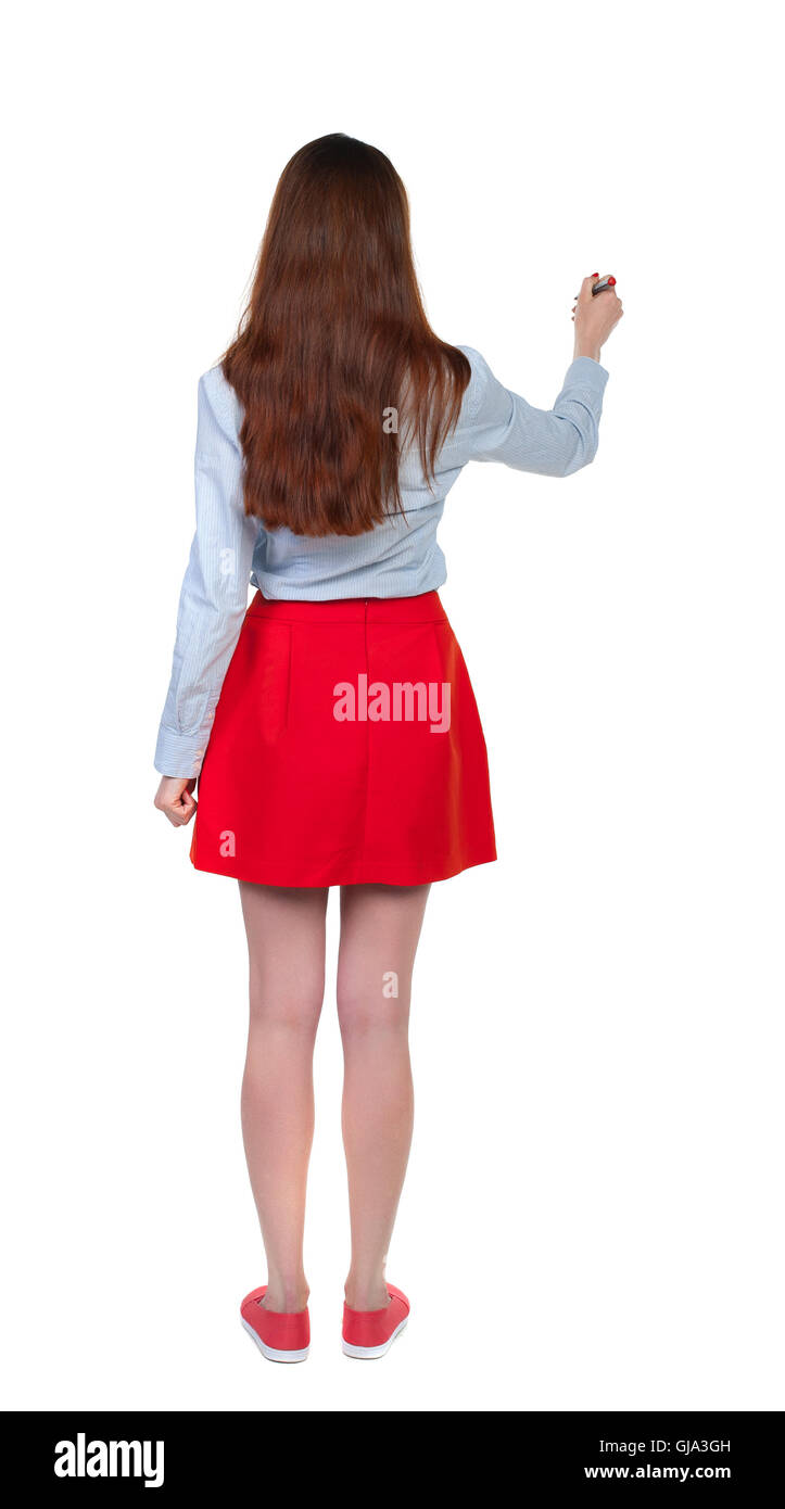 back view of writing beautiful woman. Young girl in dress Stock Photo ...