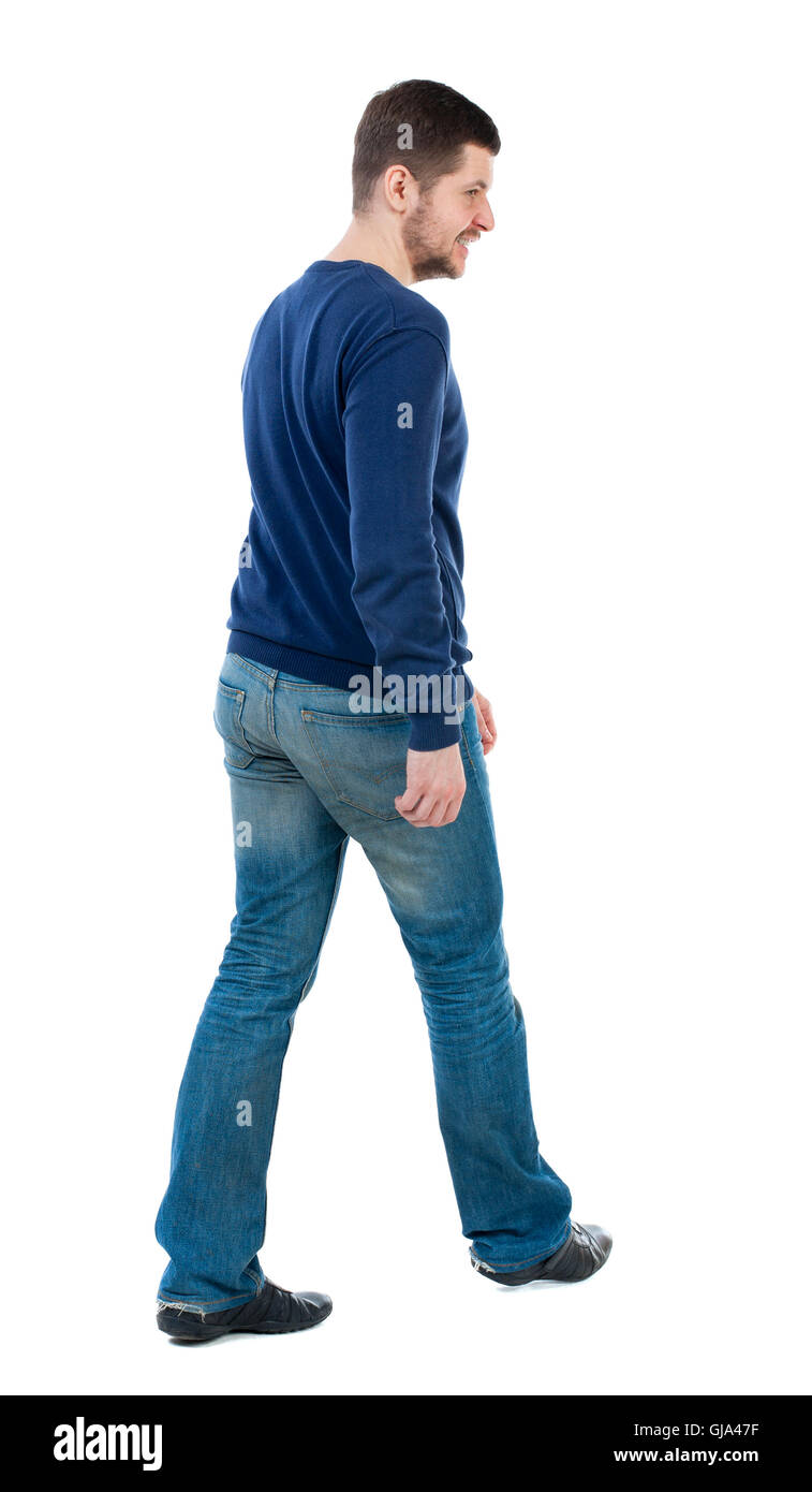 Back view of going handsome man Stock Photo - Alamy