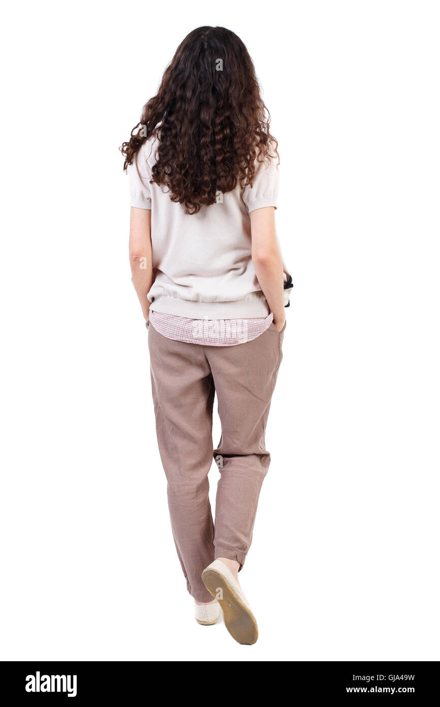 back view of standing young beautiful woman Stock Photo - Alamy