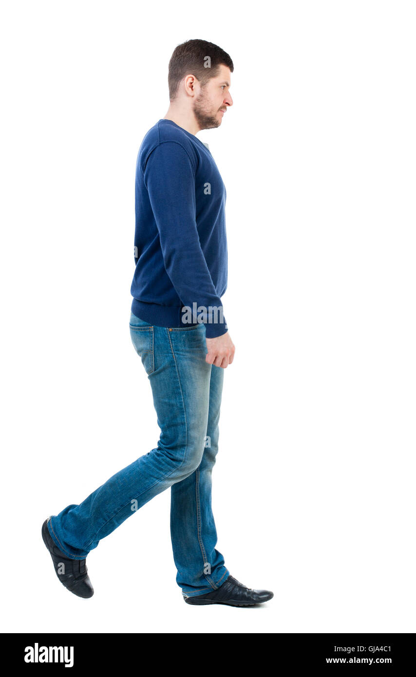 Back view of going handsome man Stock Photo - Alamy