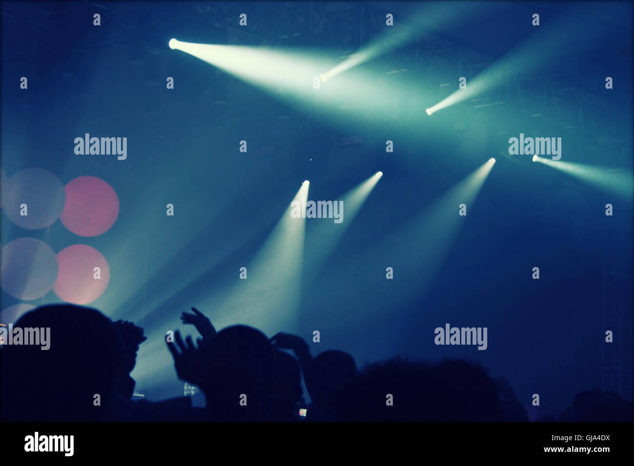 Crowd at concert and spectacular stage lights Stock Photo - Alamy